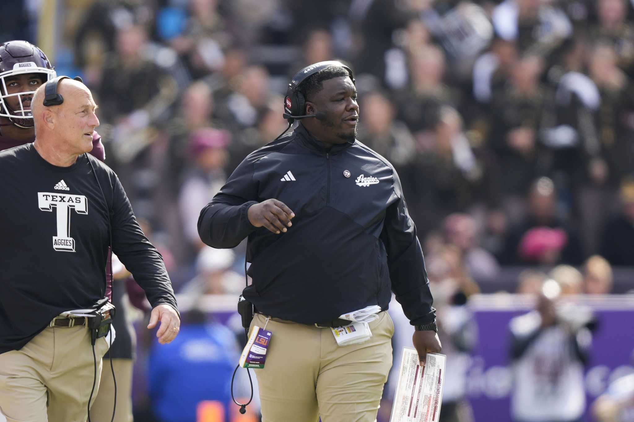 Texas A&M's Elijah Robinson serves both Aggies and Syracuse