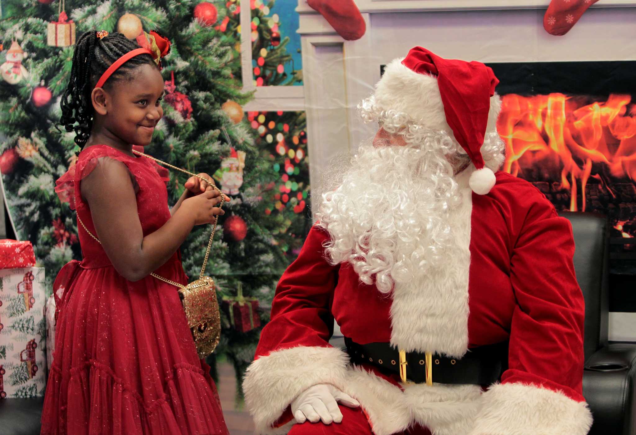 At Norwalk holiday celebration, Santa may know your teacher