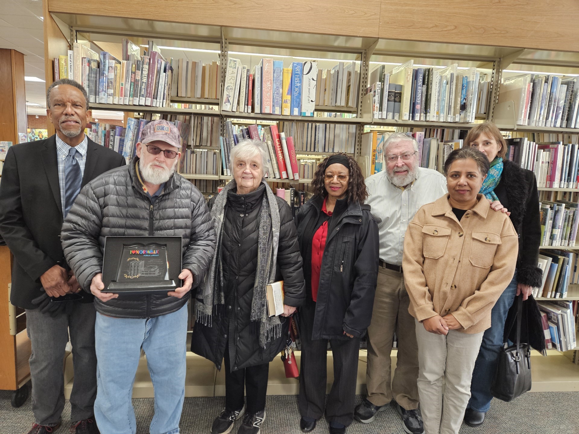 Beloved Norwalk Public Library custodian retires after 25 years