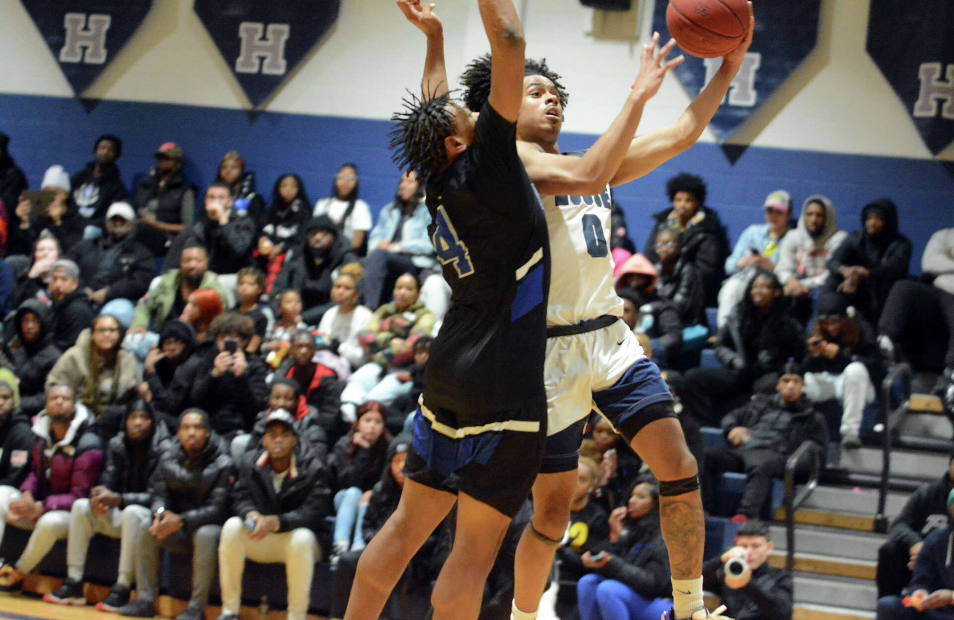 Hillhouse boys basketball overcomes slow start to handle West Haven