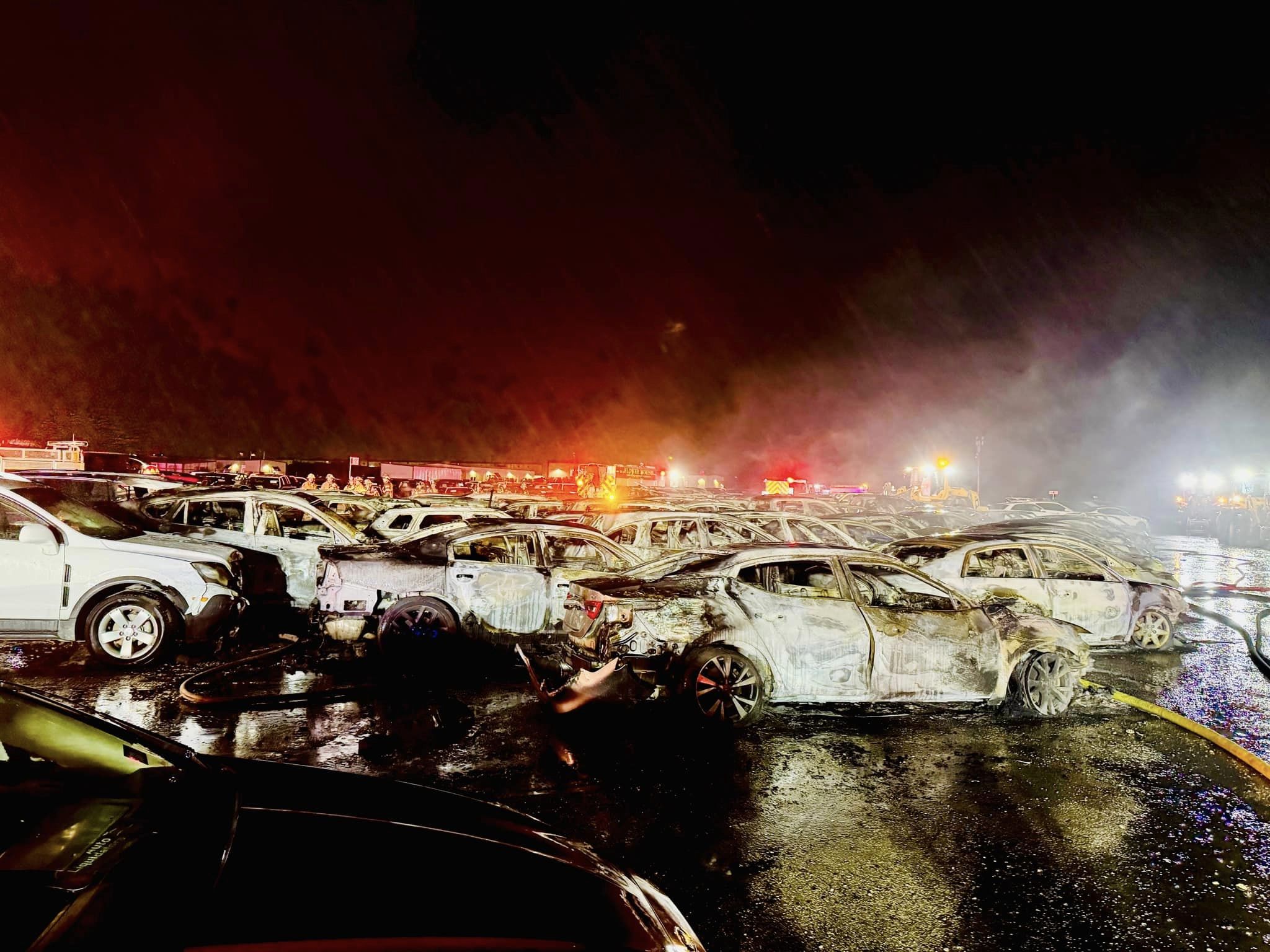 Christmas Eve fire: Nearly 60 vehicles burn at auto auction site
