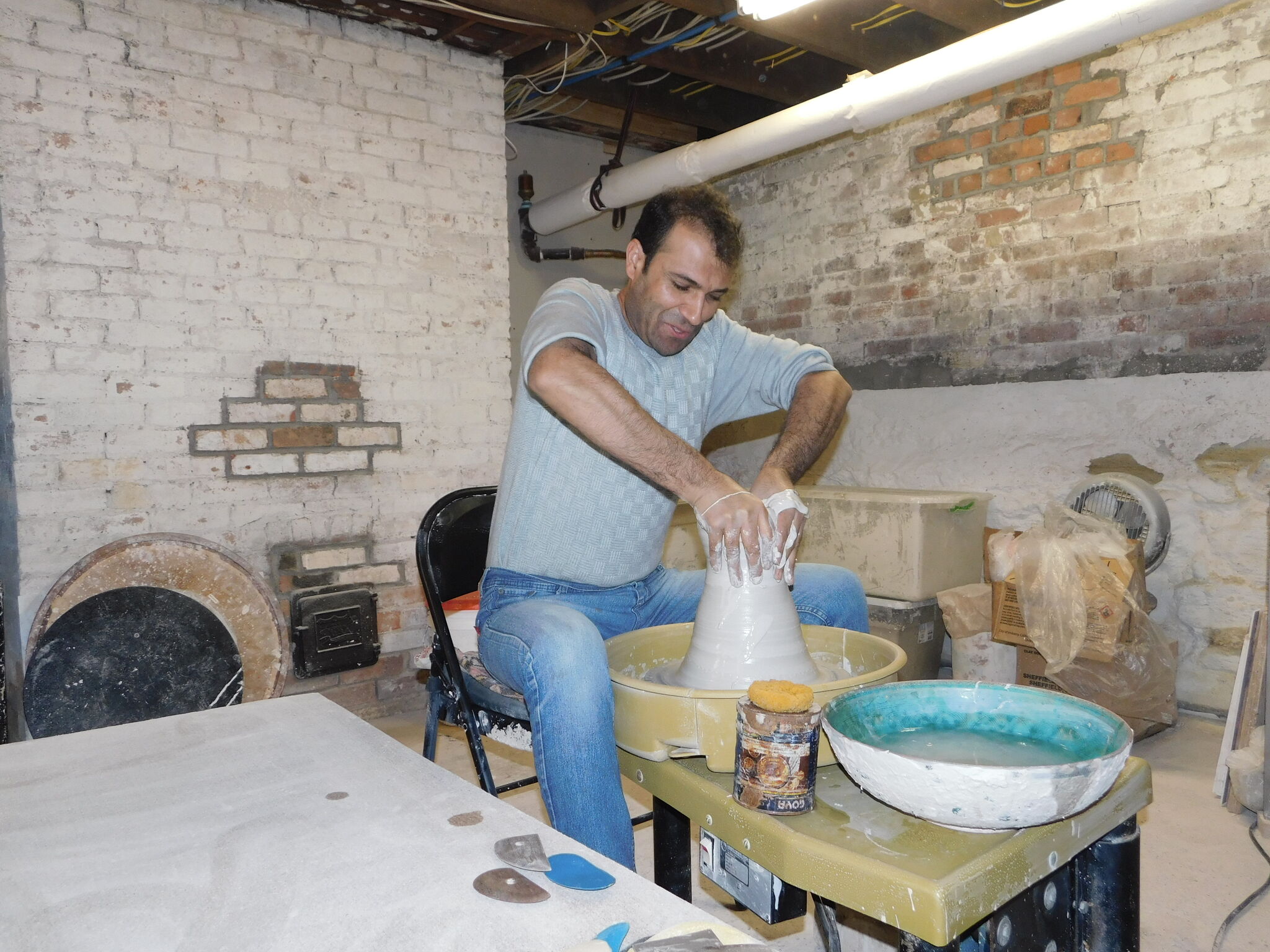 In New Milford, resettled master potter to receive creative award