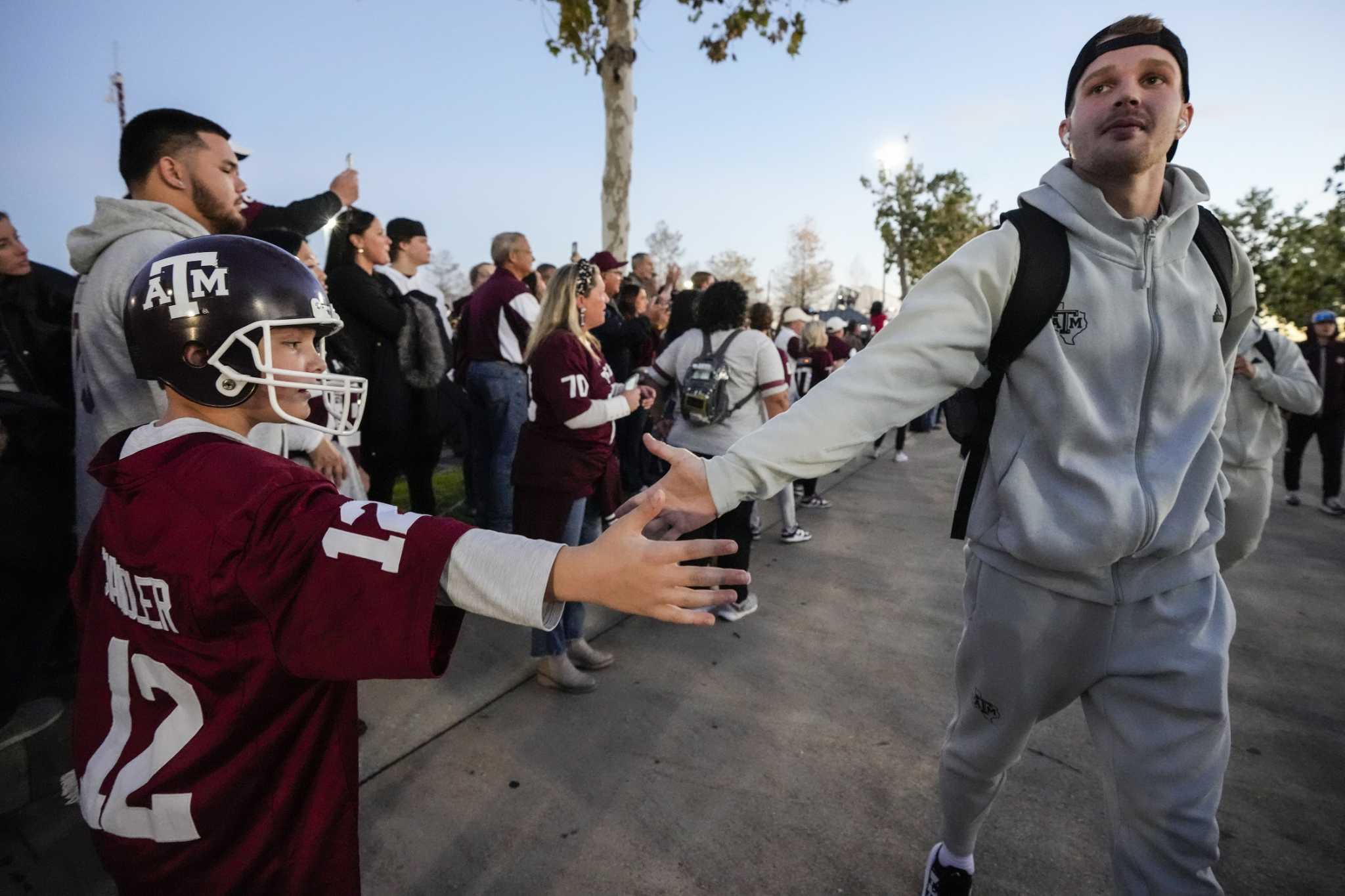 Texas Bowl photos: Texas A&M, Oklahoma St. fans arrive at NRG Stadium