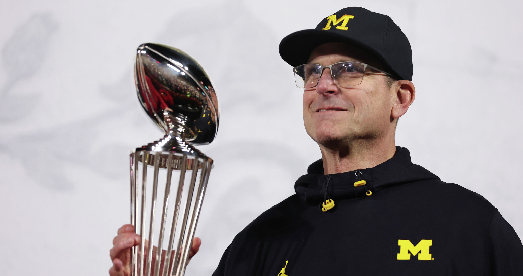 Michigan Wolverines head coach Jim Harbaugh headed to CFP final