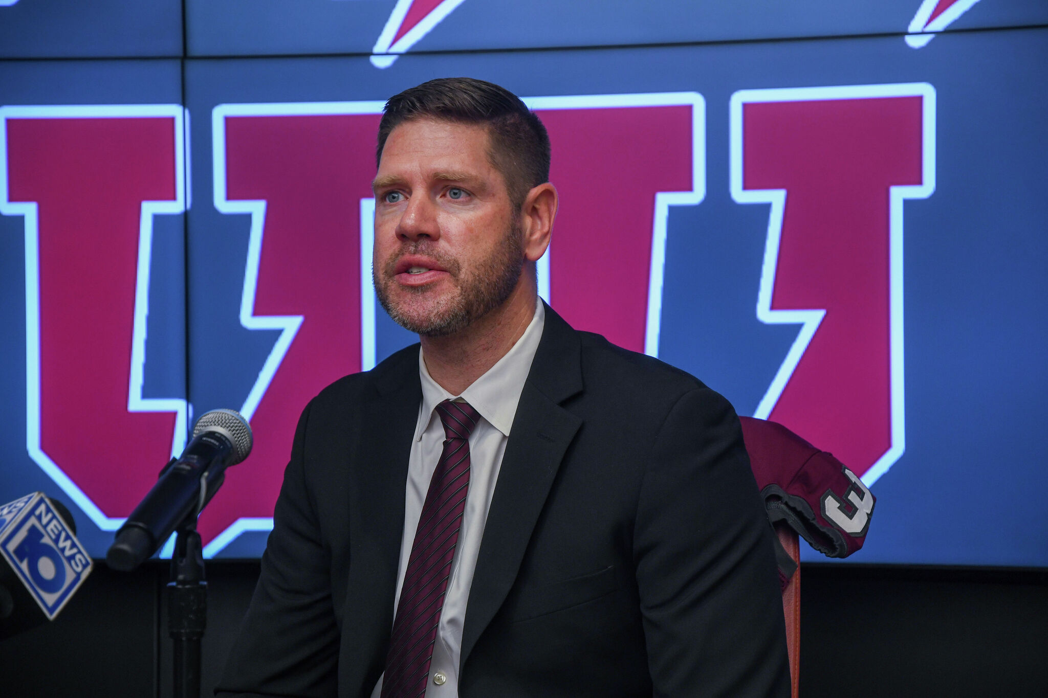 New Union College football coach Jon Drach leading spring workouts