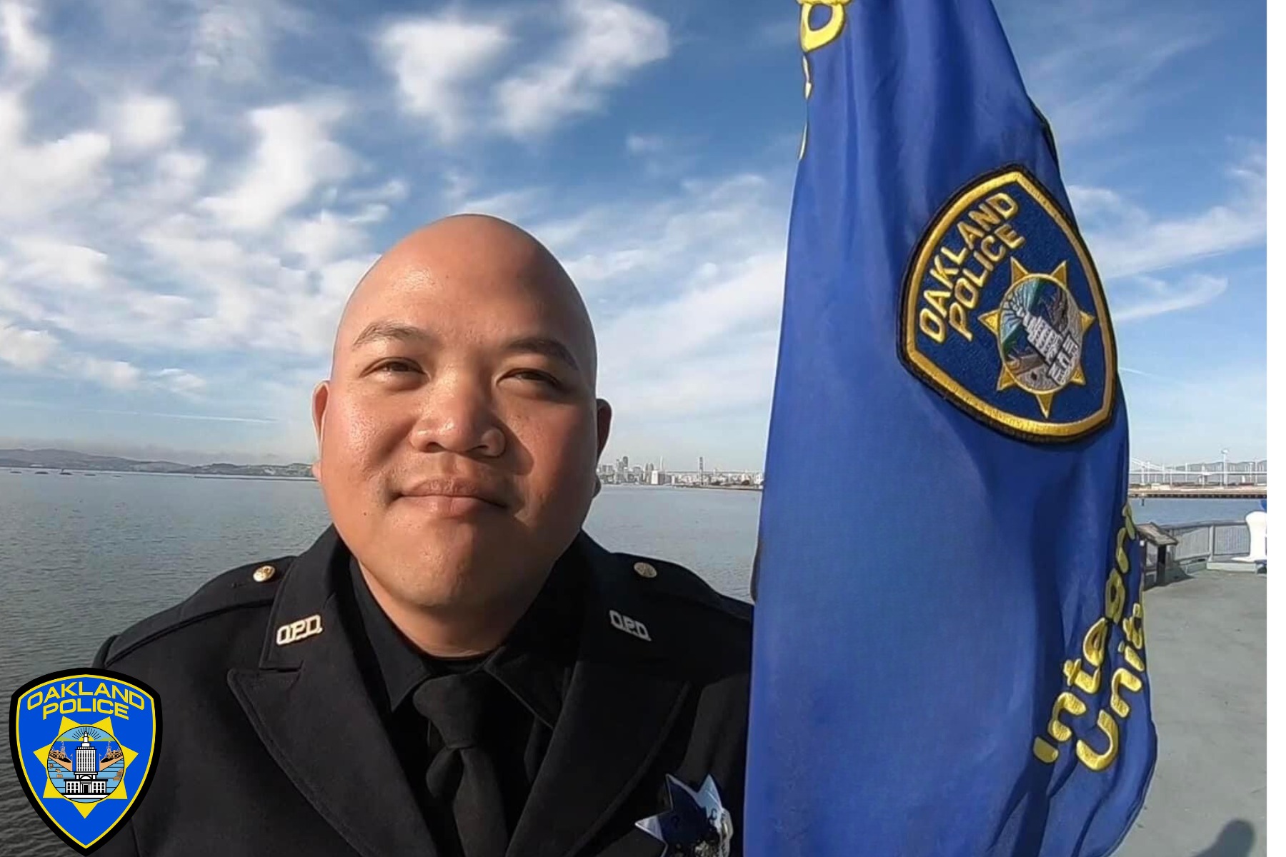Two men charged with murder in shooting of Oakland police officer