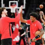 After being at death's door, Houston basketball legend Dwight Jones ...