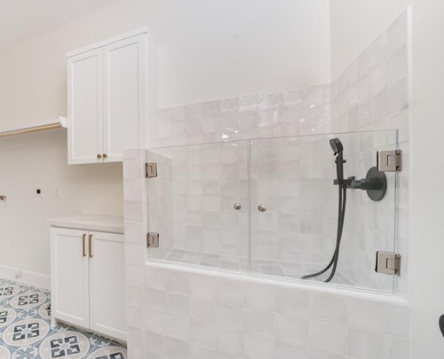 Houston’s hottest new home amenity? Custom doggy showers.