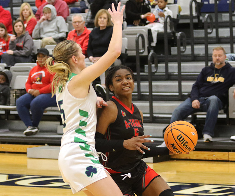Lacey's FT gives Alton 56-55 Showcase win over Chicago Young