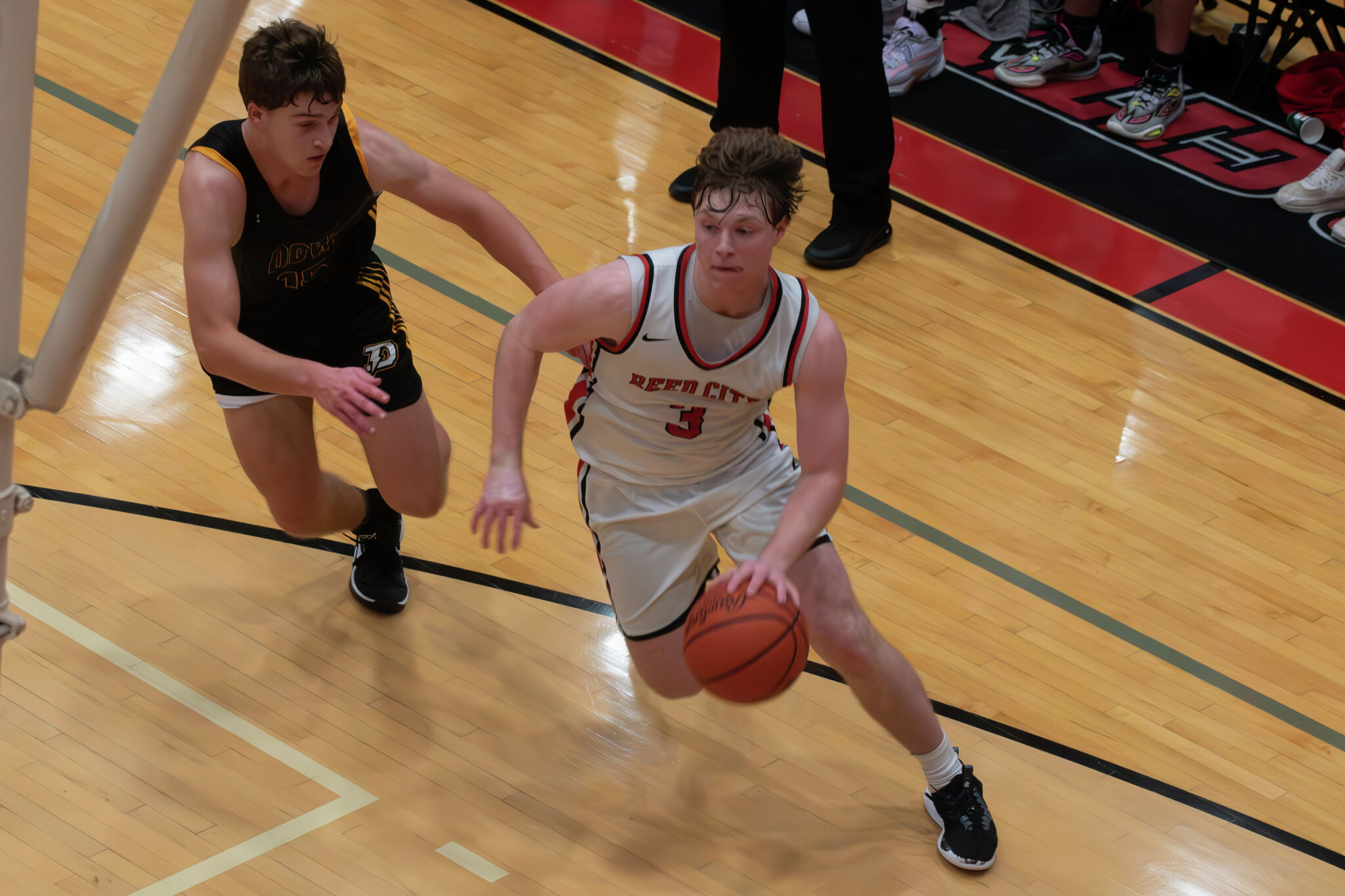 Reed City boys basketball team pulls off comeback win over Midland Dow