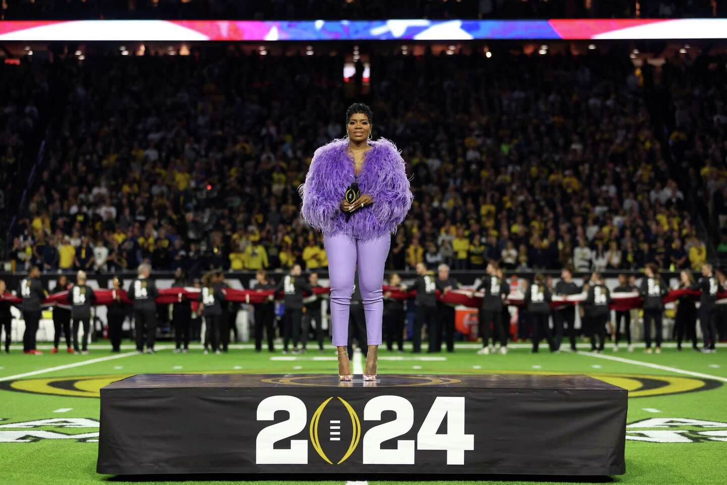 'Color Purple' star Fantasia sings National Anthem at CFP in Houston
