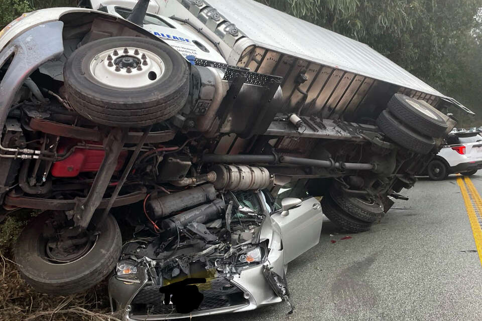 Photos of Bay Area crash show a Lexus underneath a box truck