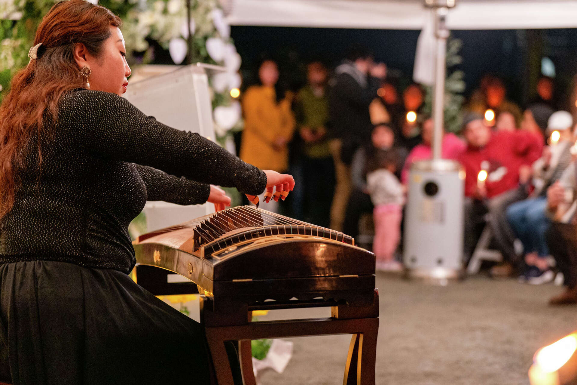 At Half Moon Bay mass shooting vigil, art, hope break language barrier
