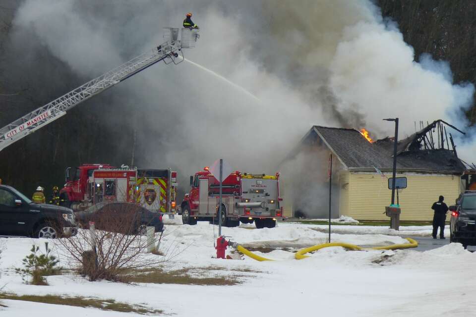 Fire crews respond to blaze in Manistee Twp. subdivision