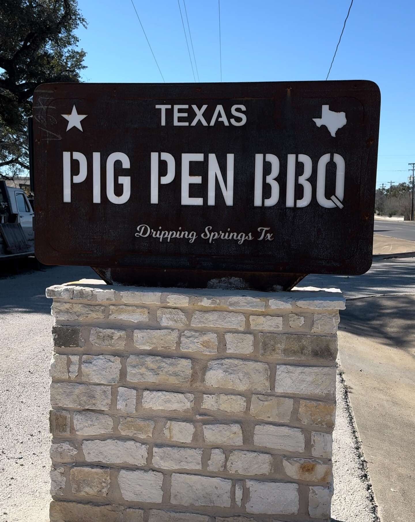 Pig Pen BBQ slices smokey brisket in Dripping Springs