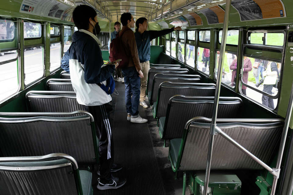 SF Muni travels back in time with vintage bus, archival photos