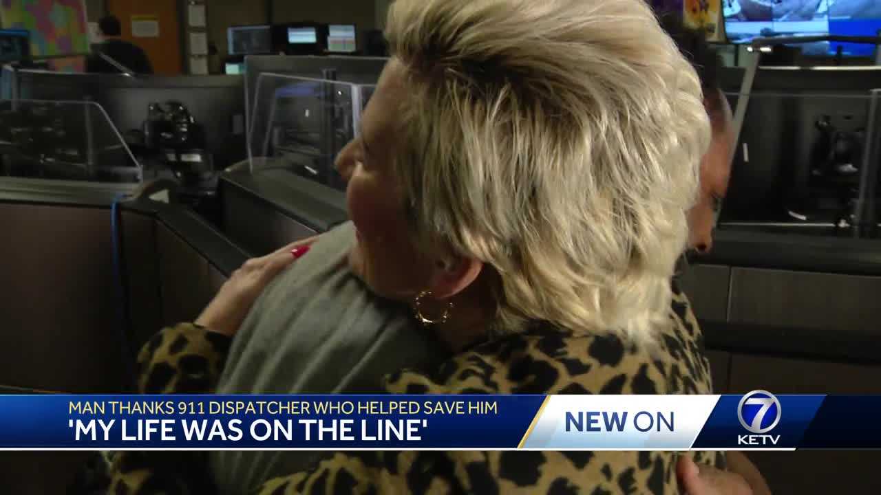 911 dispatcher gets hug from woman he helped perform CPR during blizzard