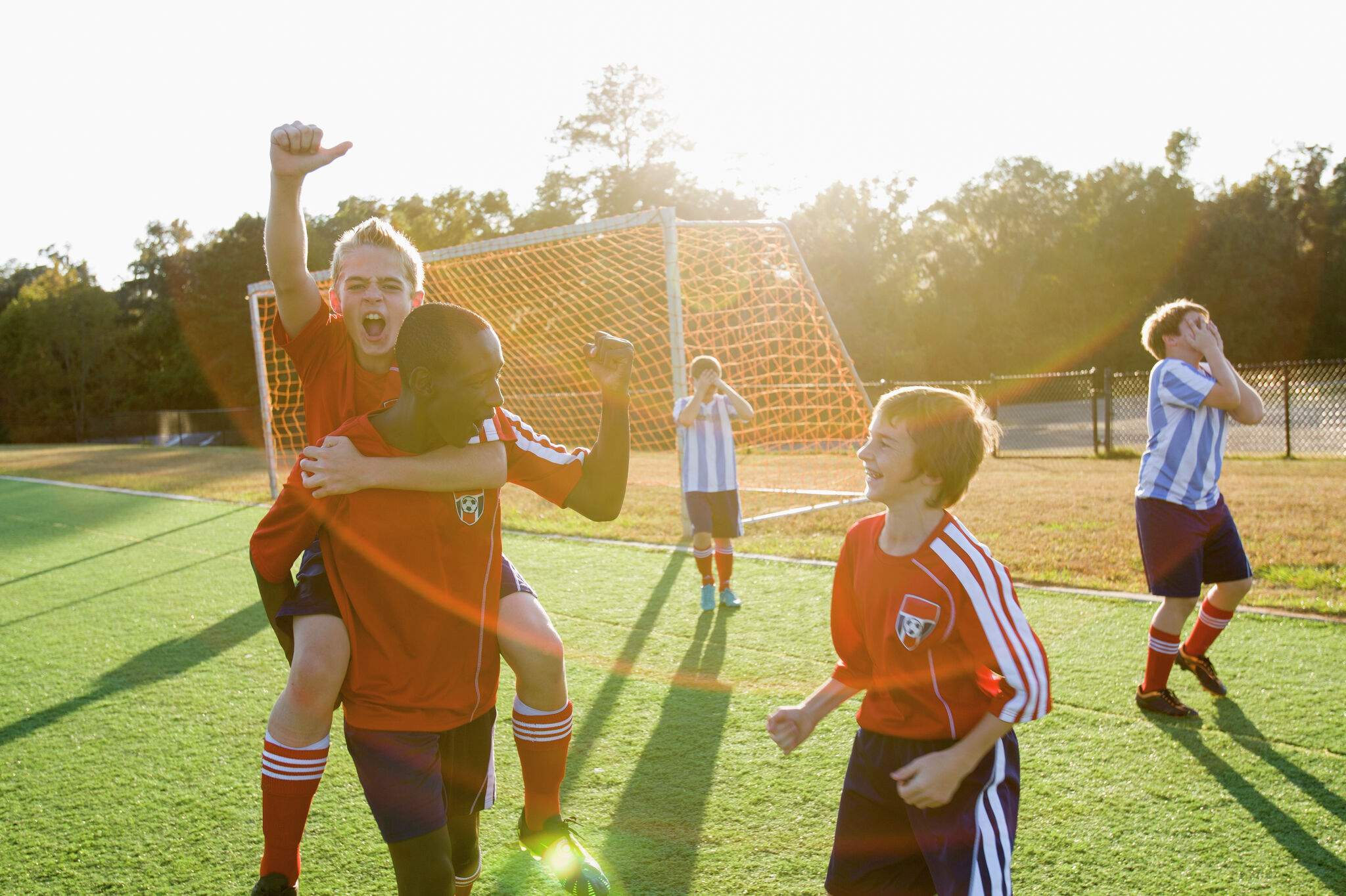 How to Take Good Photos of Your Kids Playing Sports