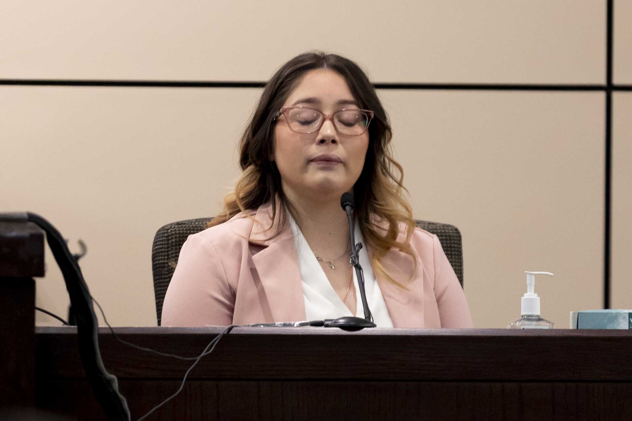 Witness at husband's murder trial says she feared for her family