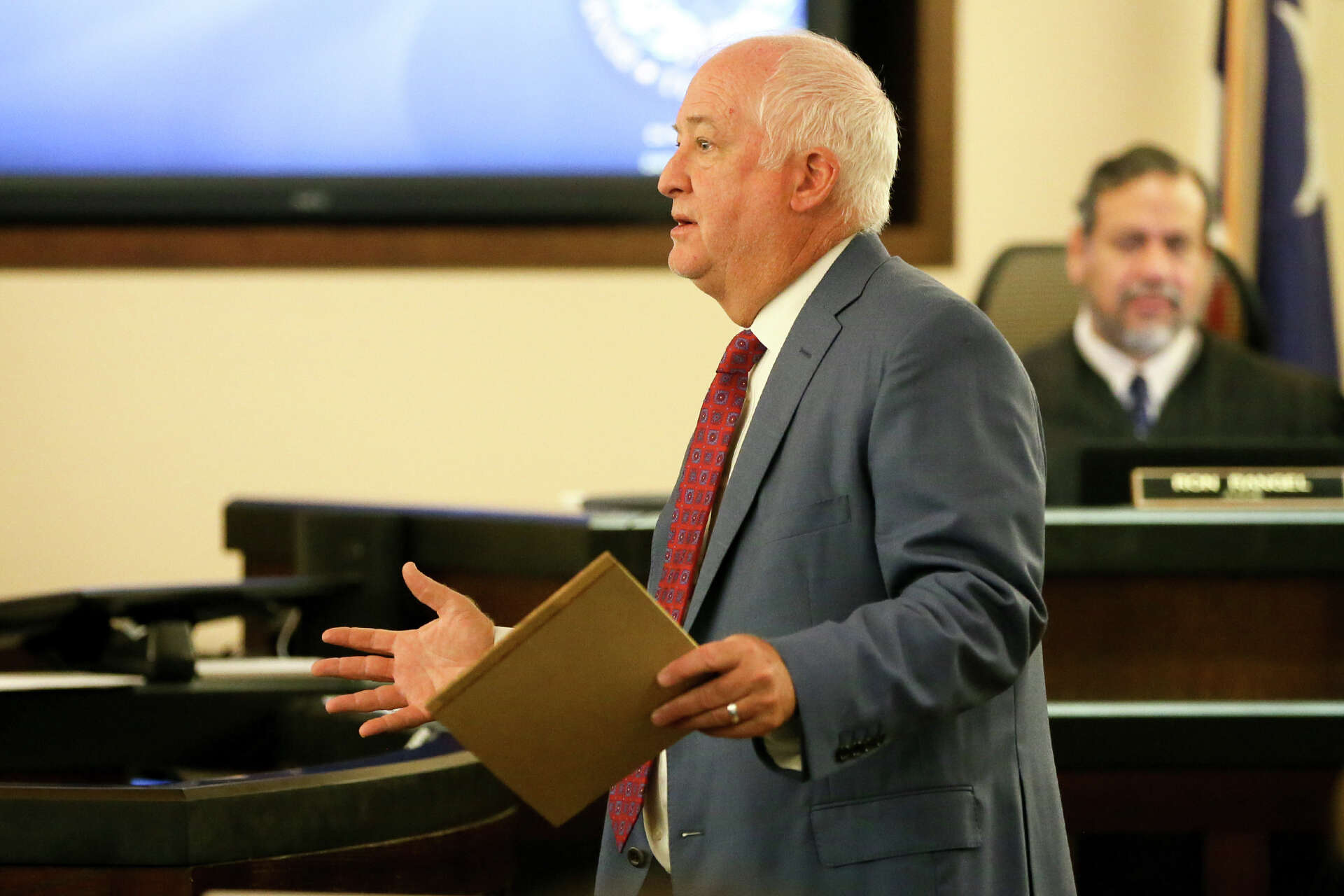 Stepmom facing charges in double killing gets prominent attorney