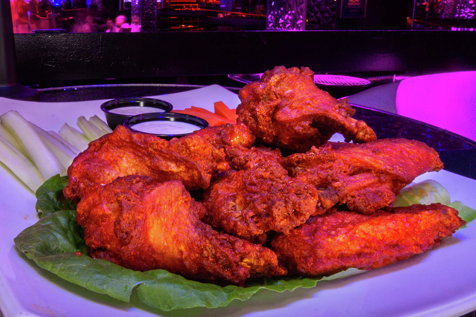 Strip clubs are struggling. One in SF lures people with chicken wings.