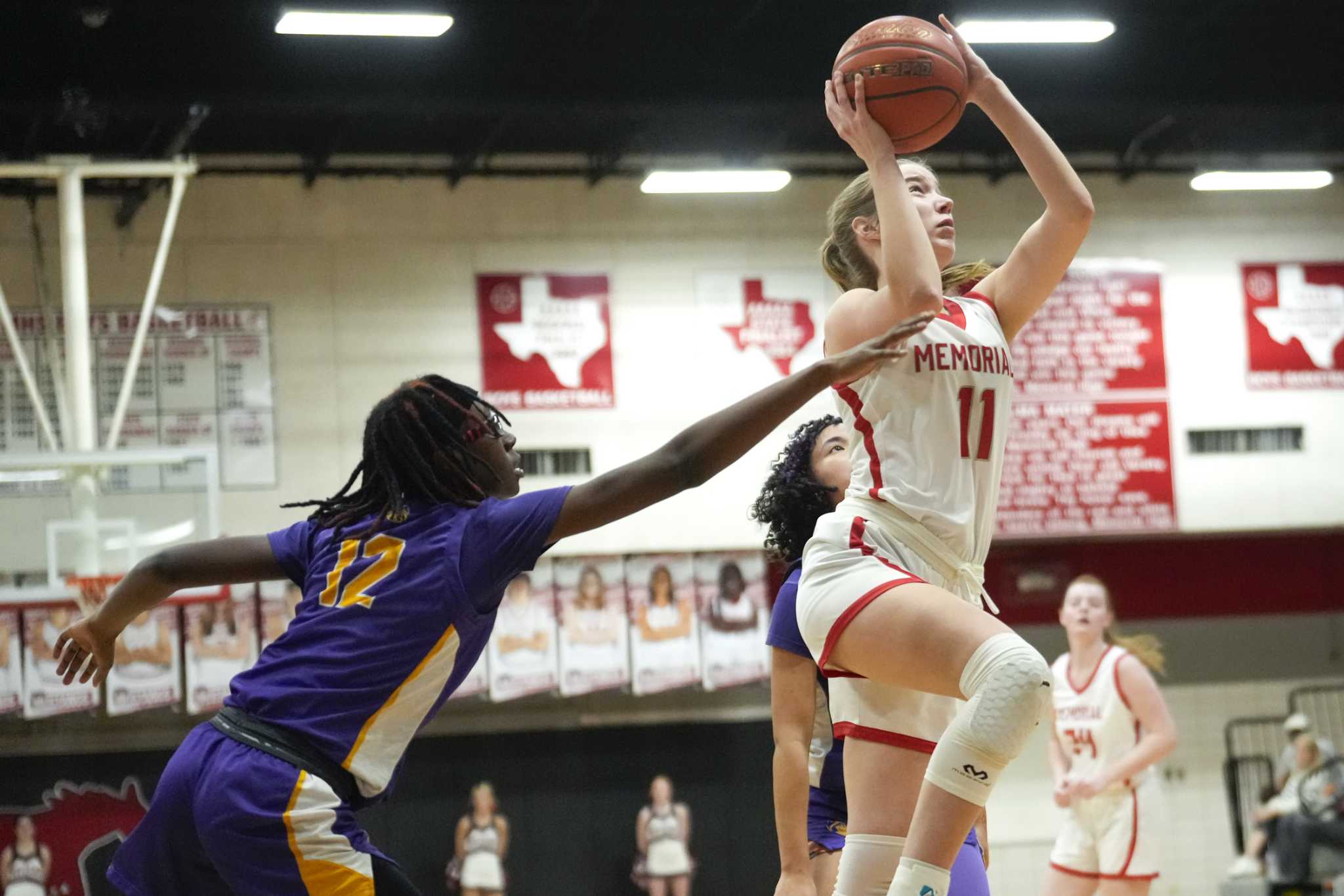 High school basketball: Memorial girls rally by Jersey Village