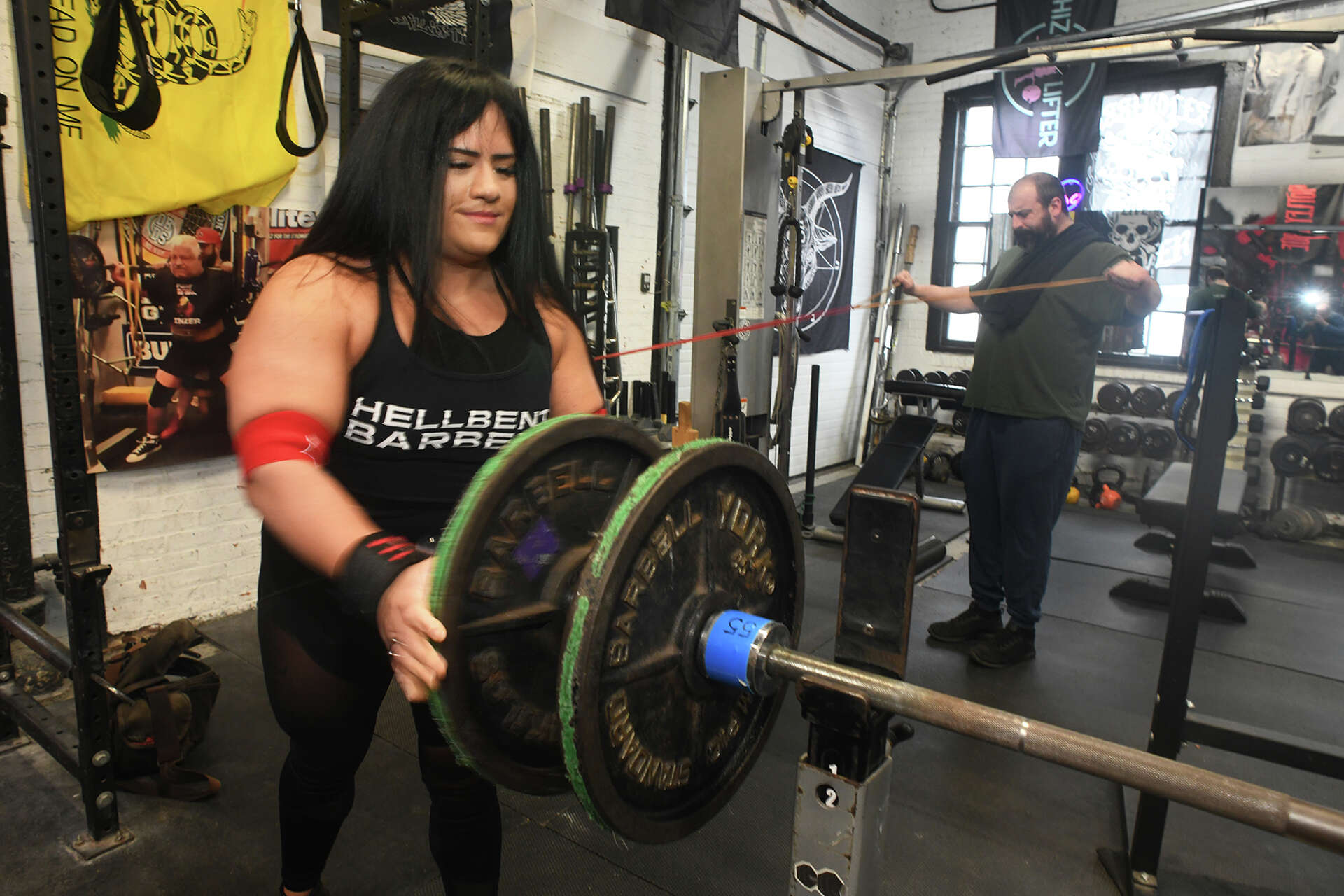 Hamden powerlifter, Bridgeport nurse breaks female bench press record