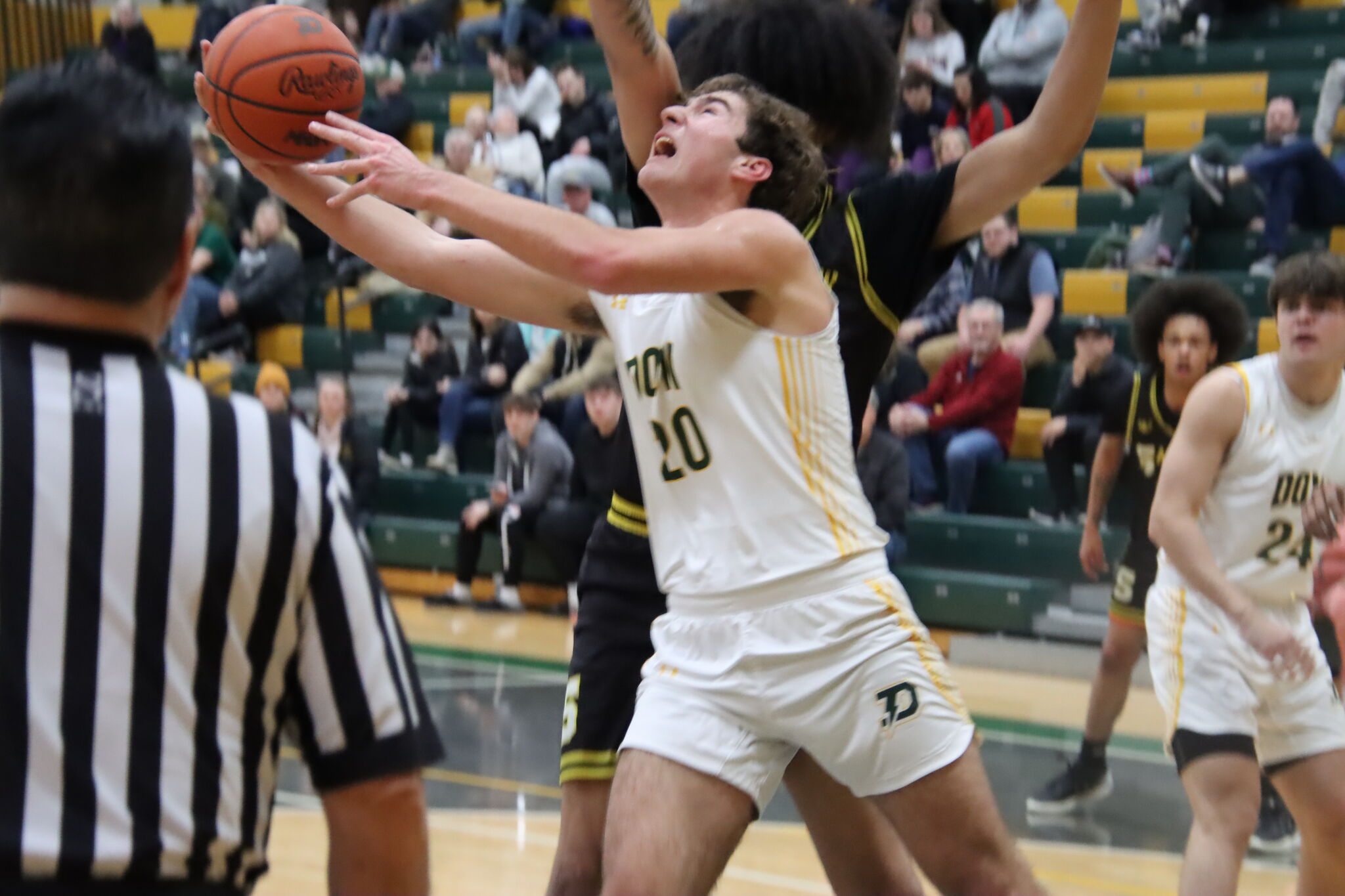 Dow boys battle but fall to Trojans