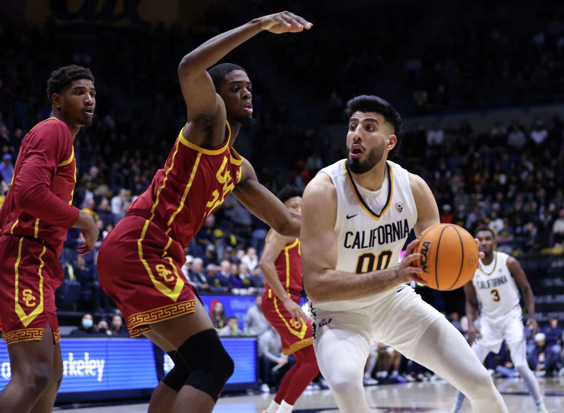 Cal men forced into OT but thrill sellout crowd by fending off USC