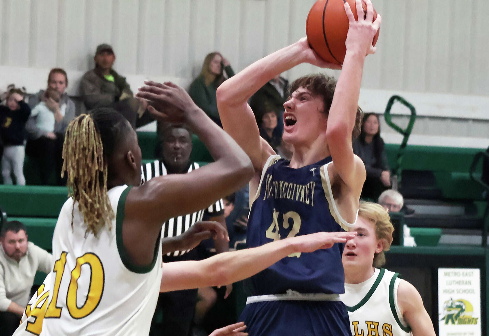 O’Bryant Brown’s half-courter gives MELHS momentum in win over FMCHS