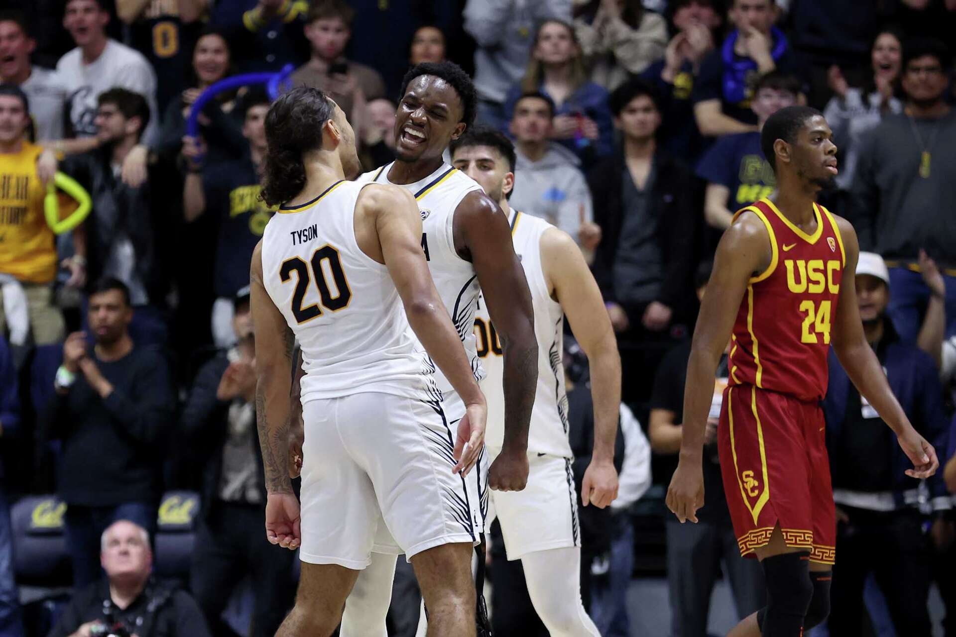 Cal men forced into OT but thrill sellout crowd by fending off USC