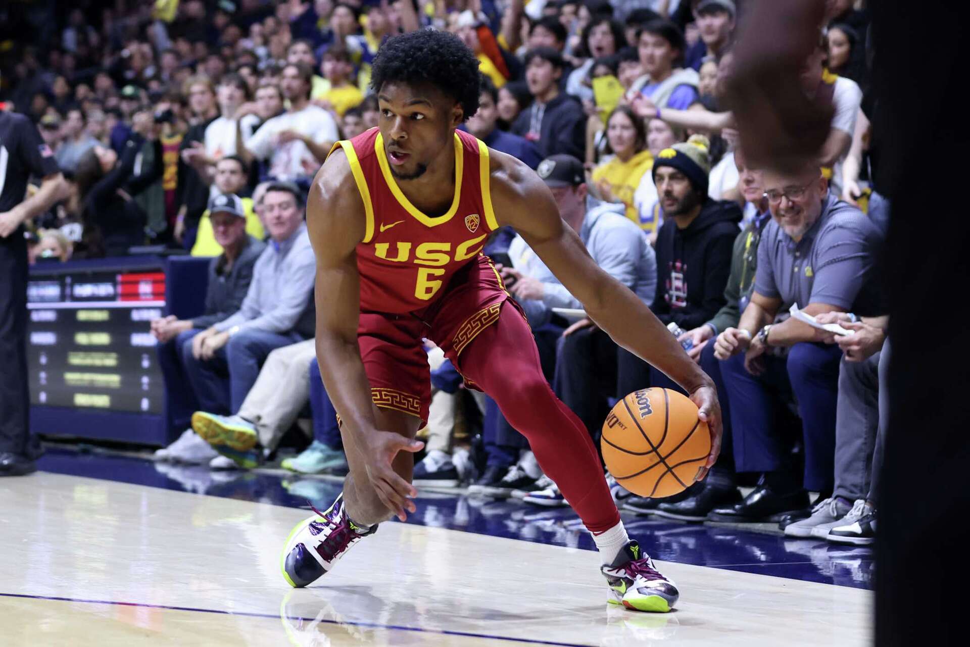 Cal men forced into OT but thrill sellout crowd by fending off USC