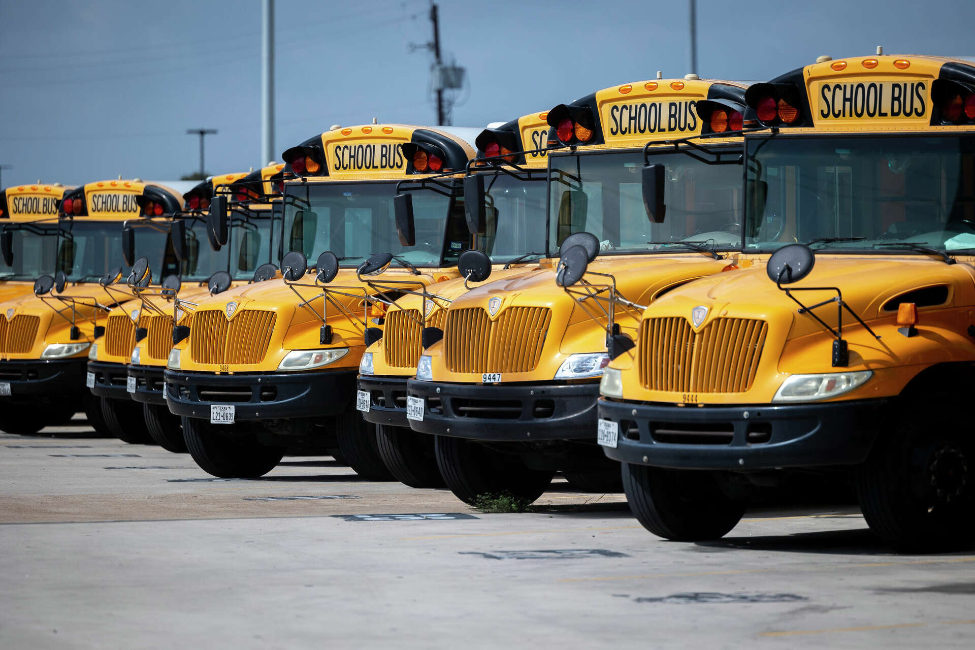 Houston school bus falls into 12-foot-deep hole in road