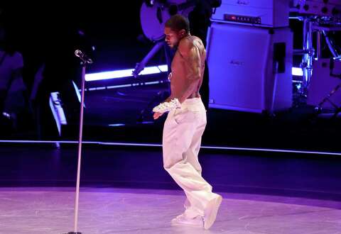 Surprises, Spectacle and Six-Pack Abs: Usher at the Super Bowl