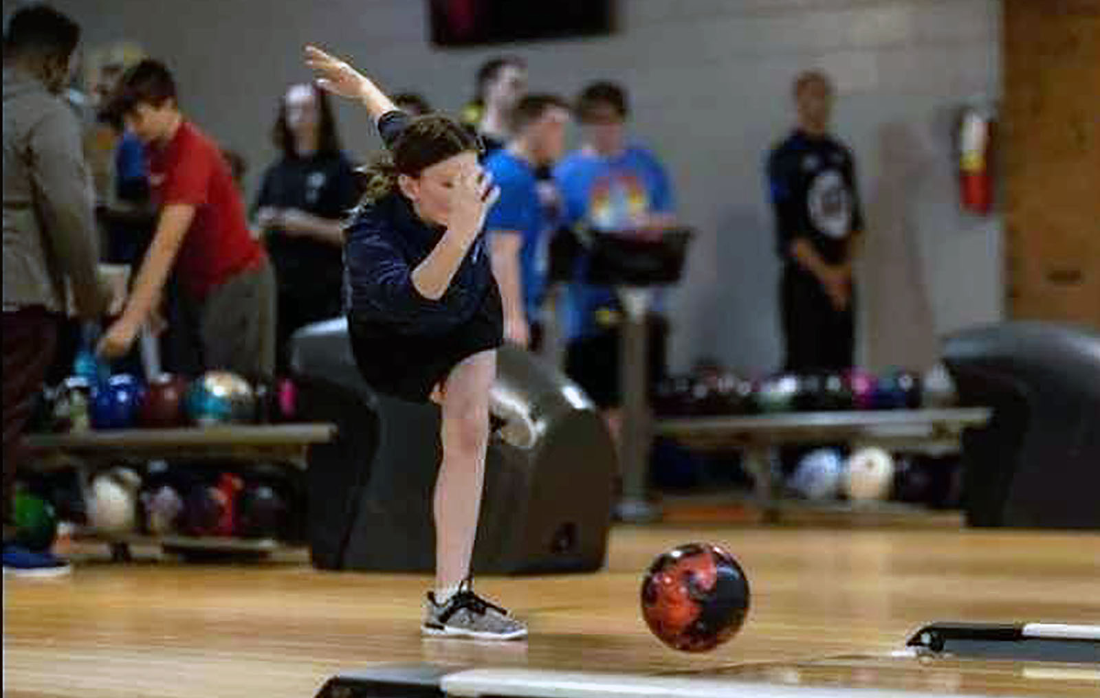 Alton's Dwiggins holds her own at state, but falls short of advancing