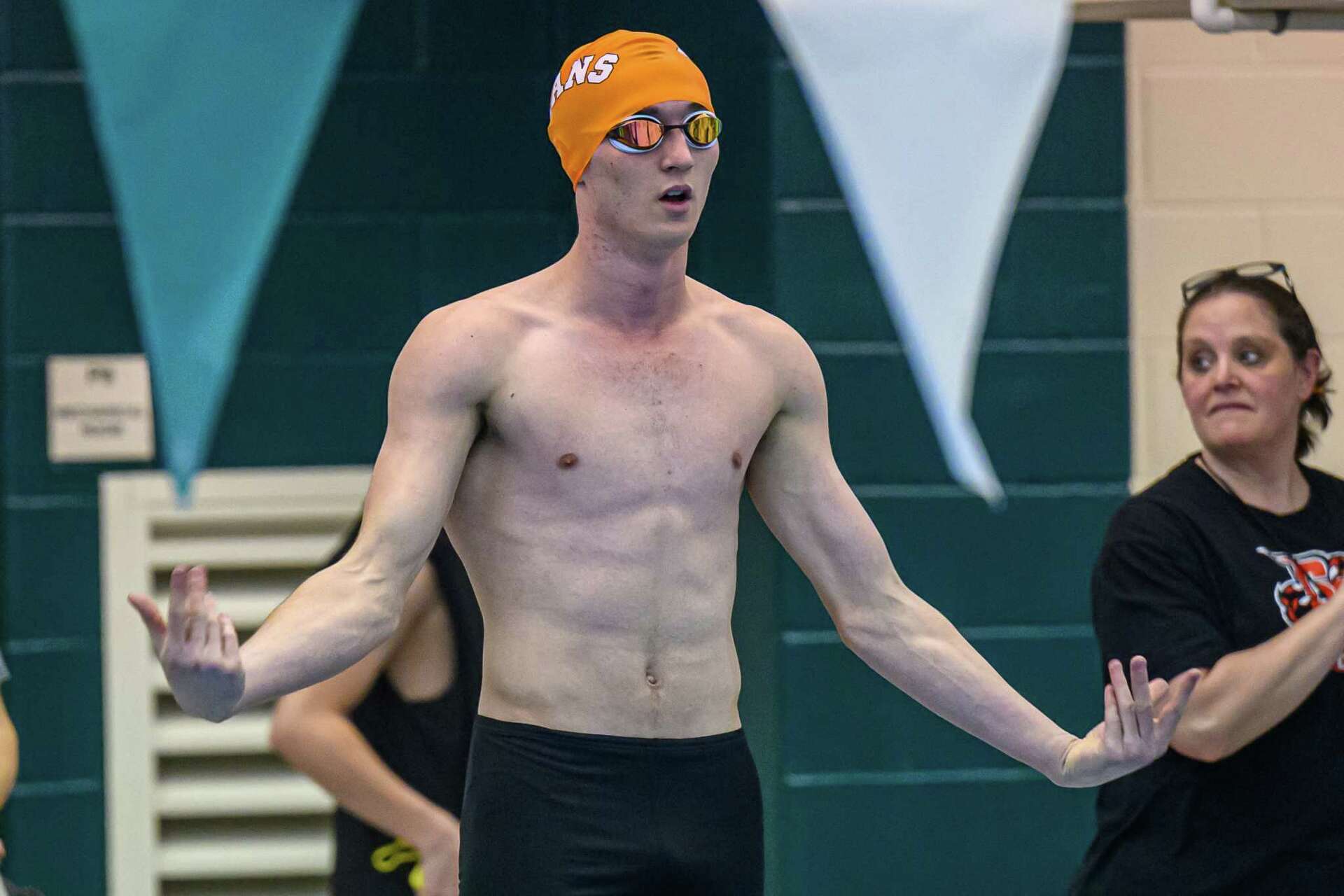 Howard adds a swimming sectional title to his scholastic resume