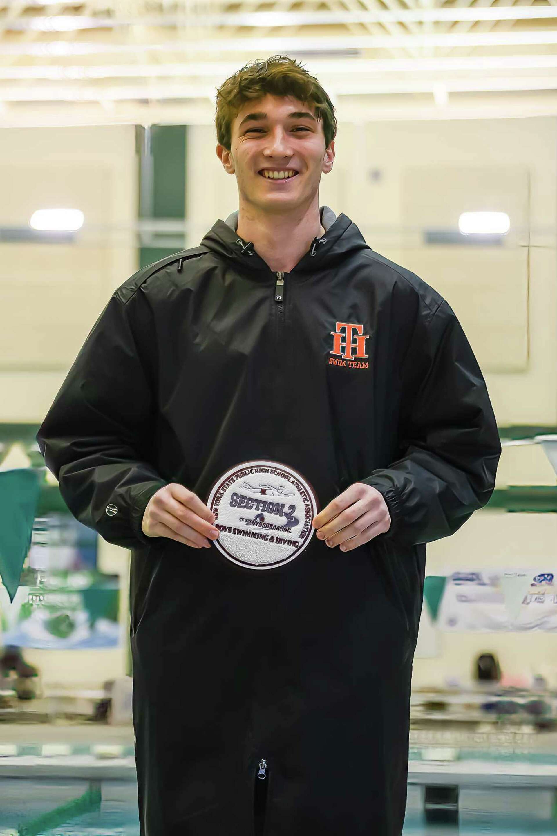Howard adds a swimming sectional title to his scholastic resume