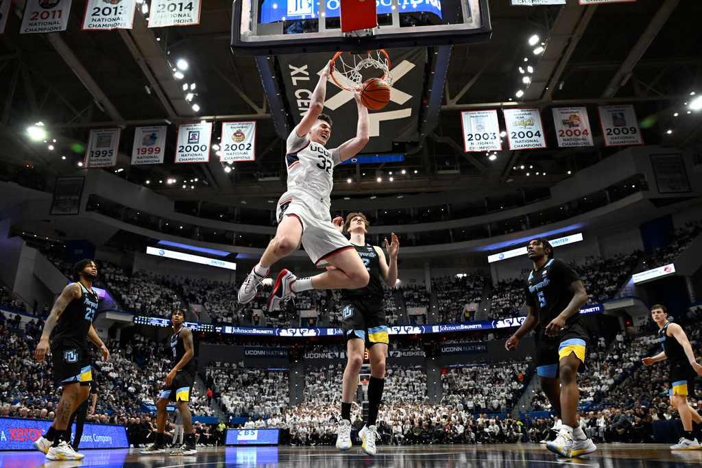 Donovan Clingan leads UConn men's basketball over Marquette.