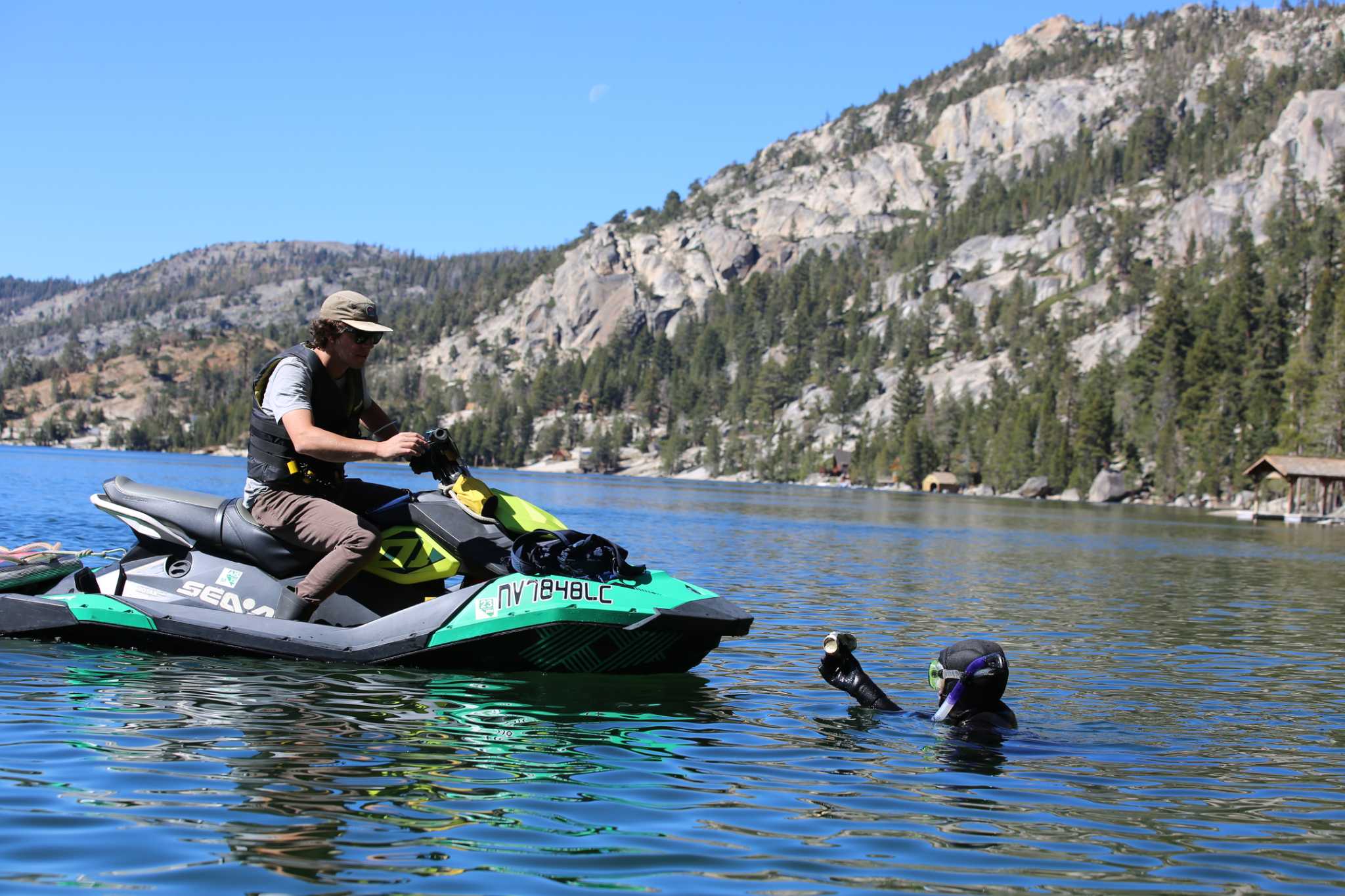 What trash did California scuba divers just find in a lake near Tahoe?