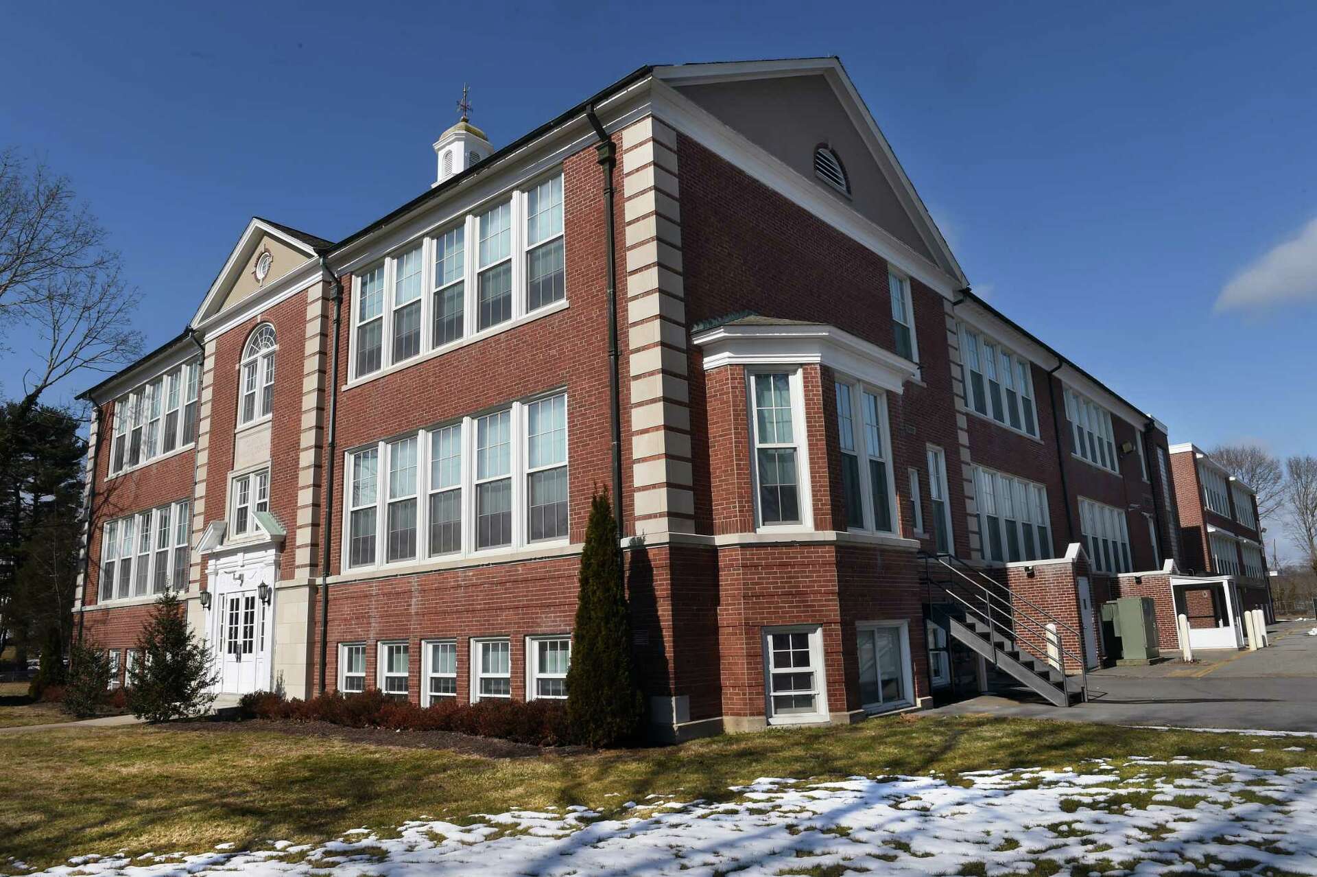 Turning Clinton school into housing will take time, officials say