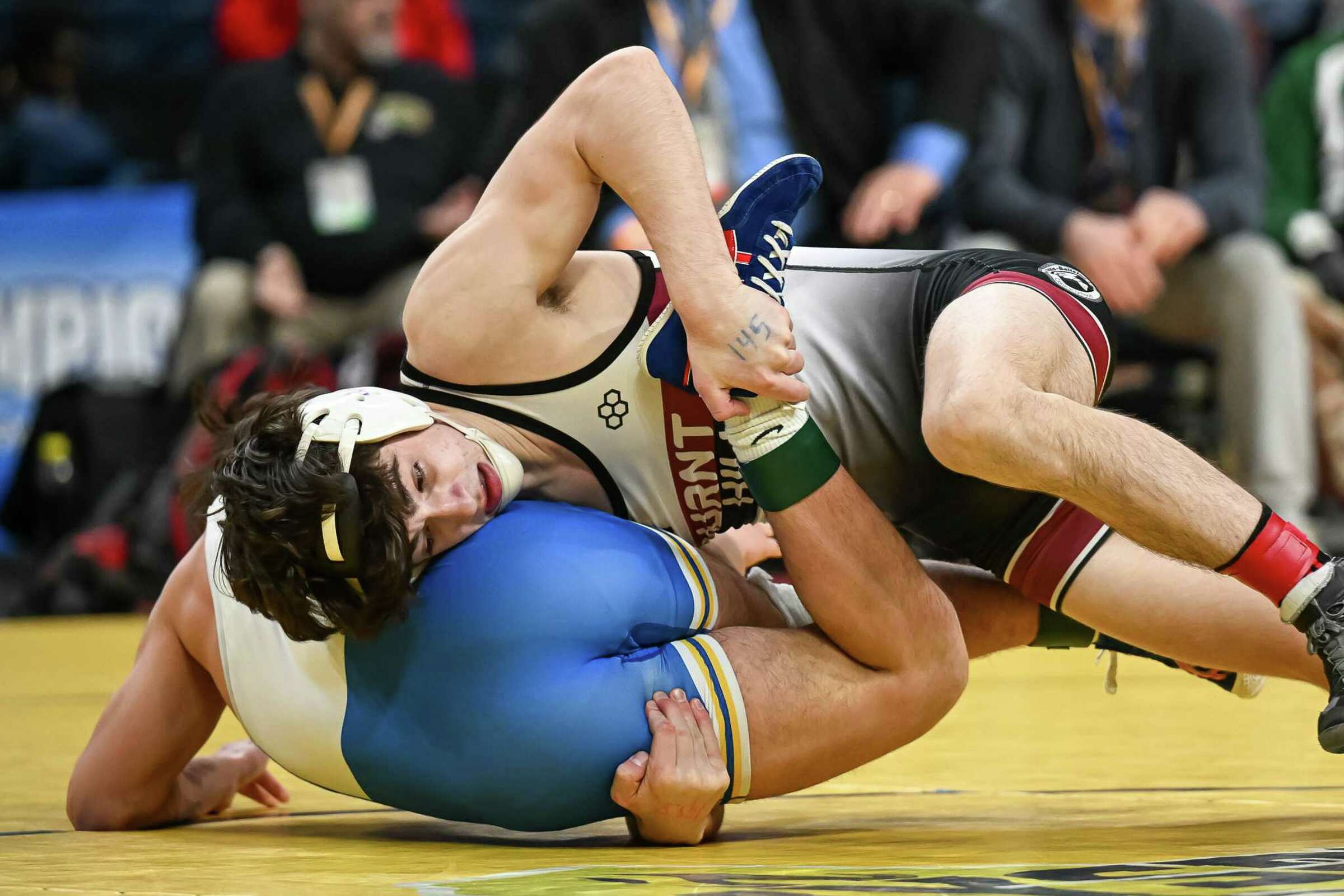 Liam Carlin captures first state wrestling title