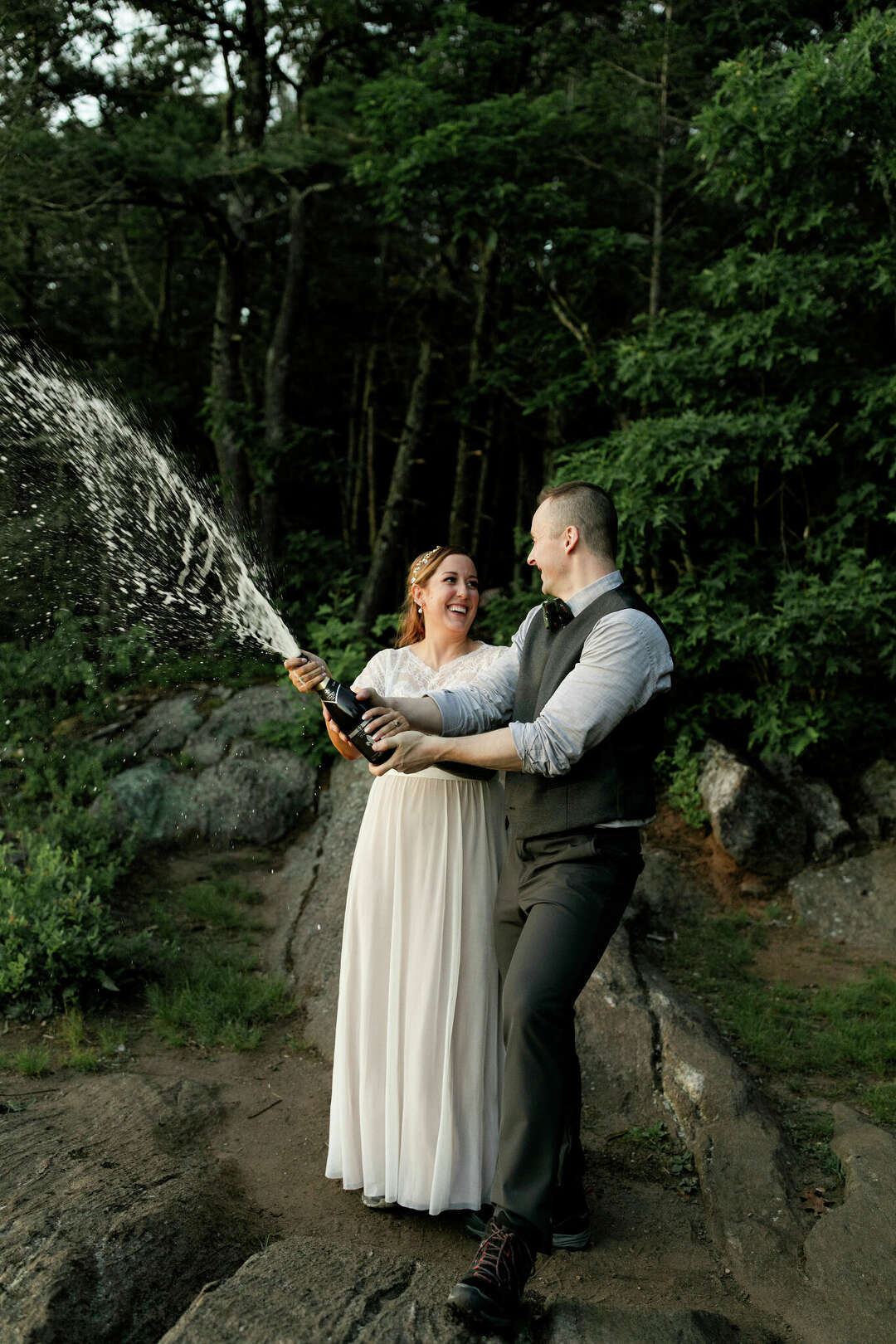 The bride wore hiking boots for Peoples Forest elopement in CT
