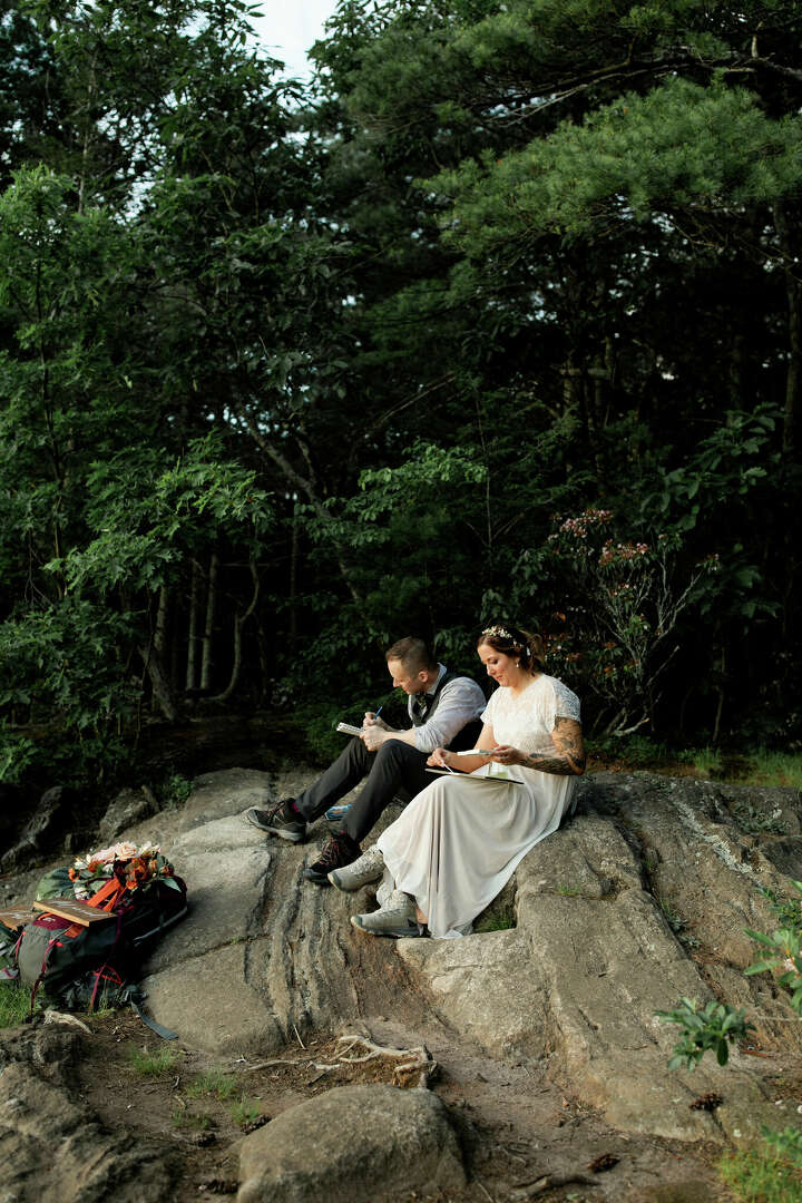 The bride wore hiking boots for Peoples Forest elopement in CT