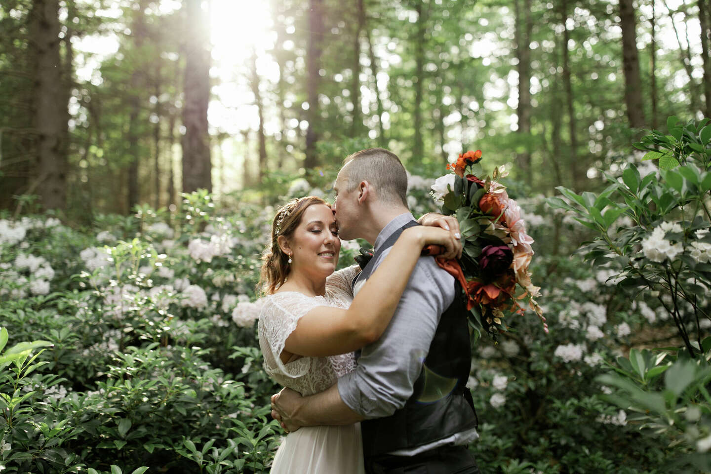 The bride wore hiking boots for Peoples Forest elopement in CT