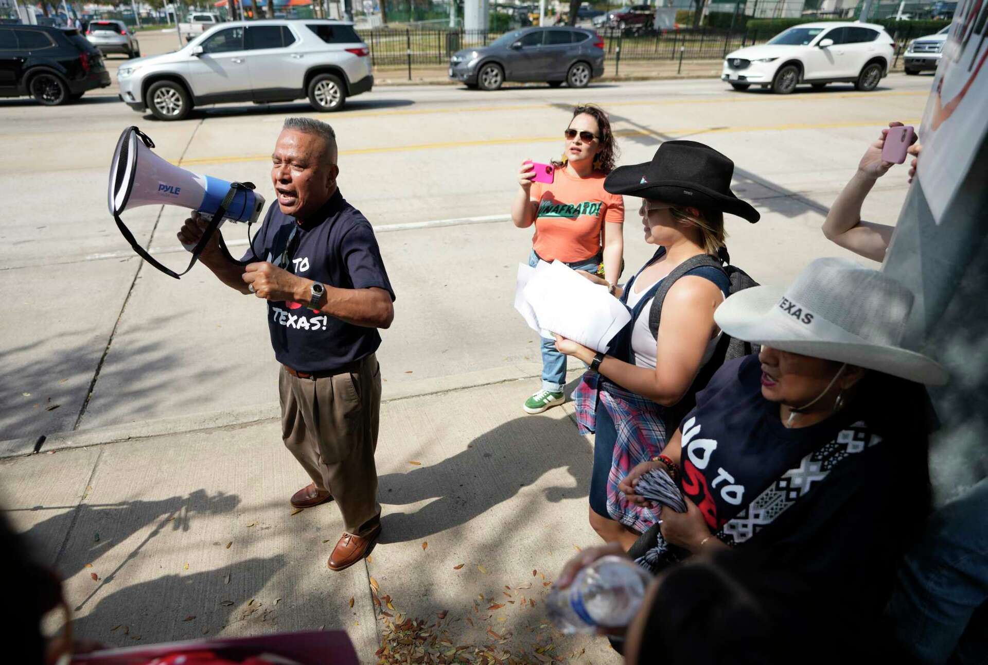Houston rodeo protesters rally against new Texas immigration law