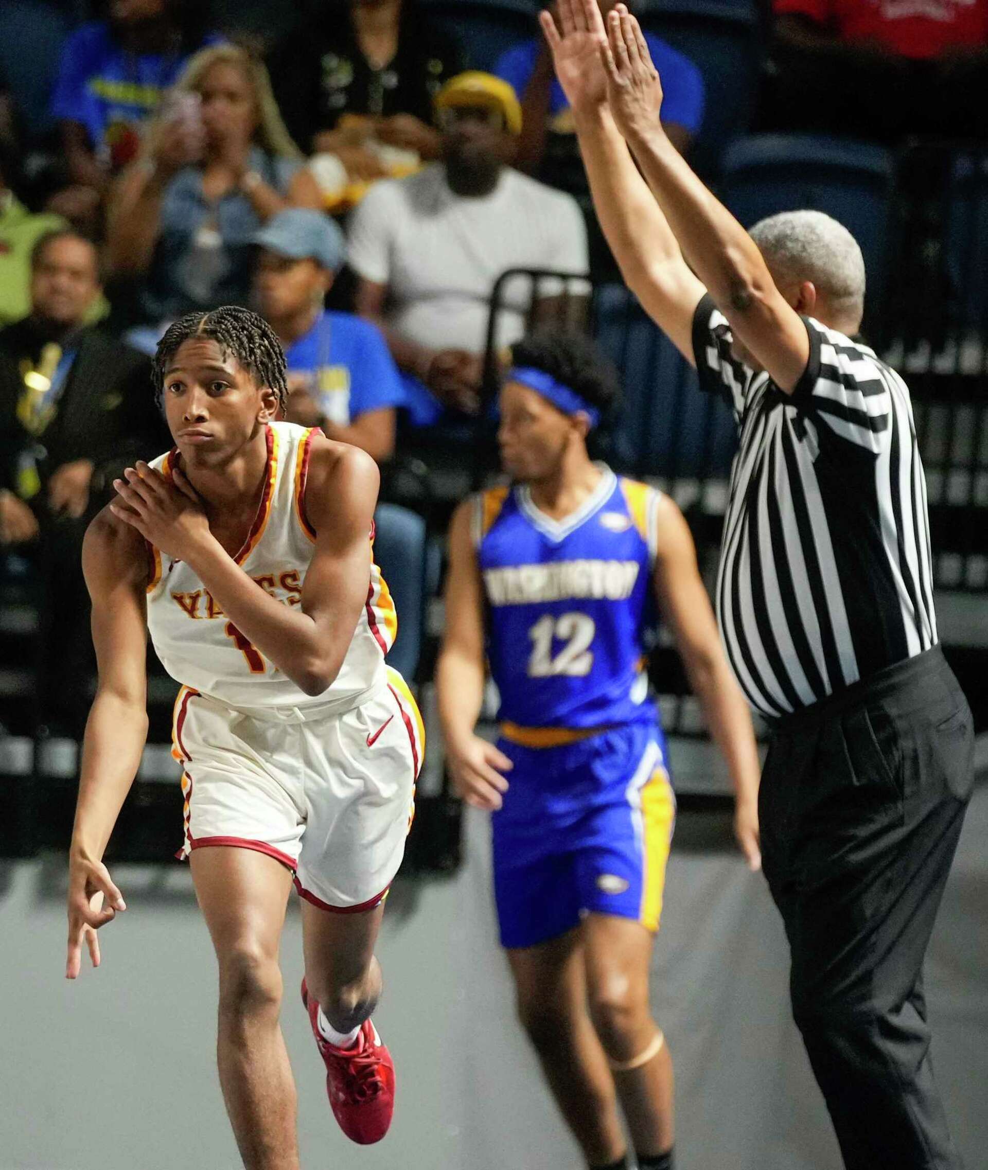 High school basketball: Washington storms into region semis