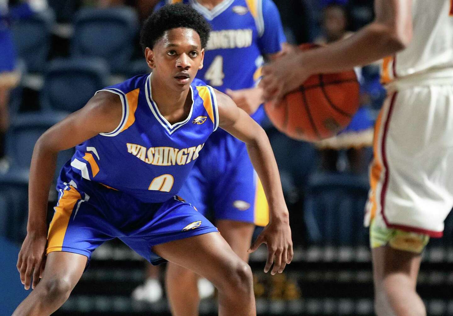 High school basketball: Washington storms into region semis