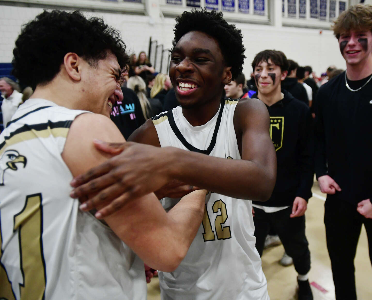 Trumbull captures FCIAC boys basketball title over Staples in OT