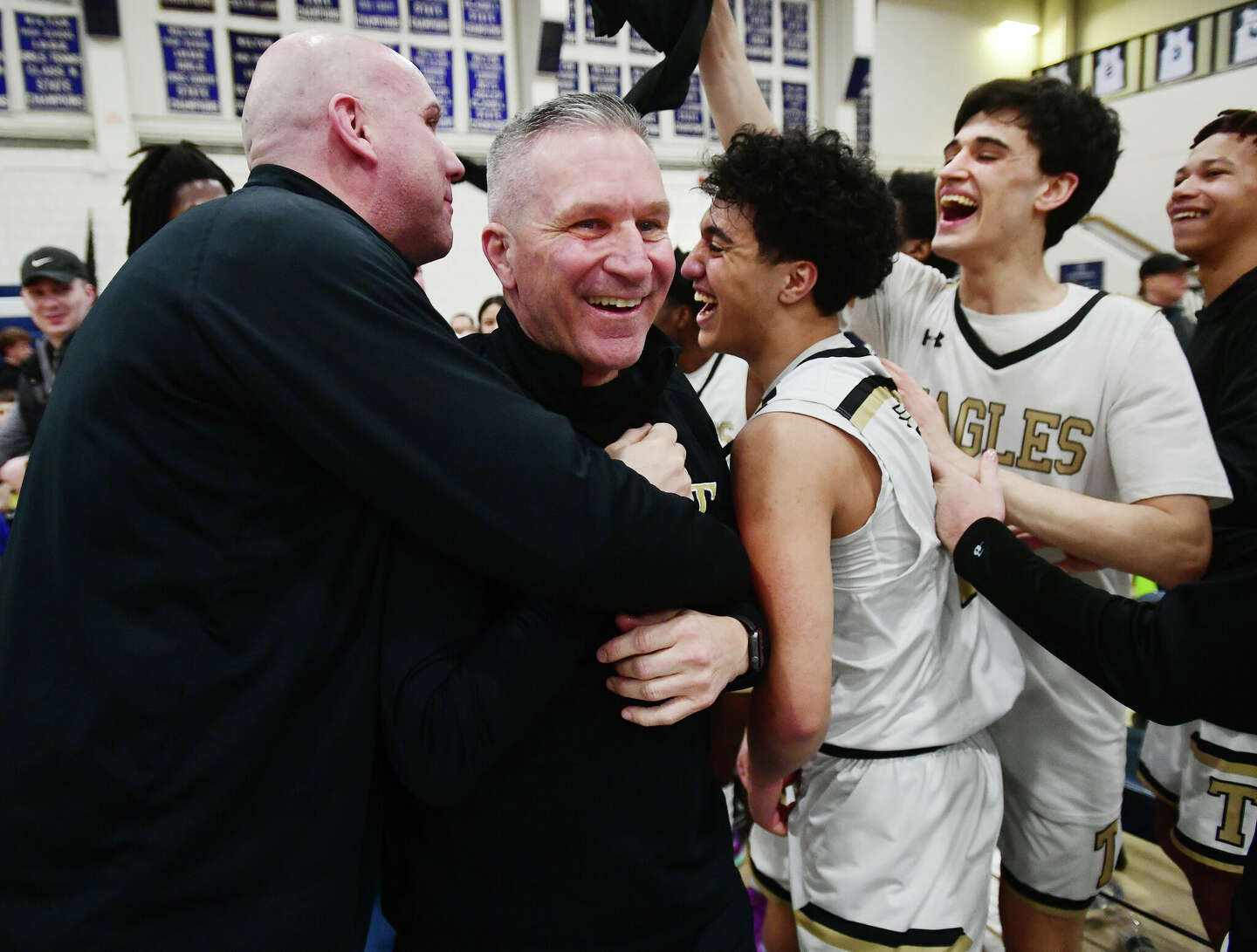 Trumbull captures FCIAC boys basketball title over Staples in OT
