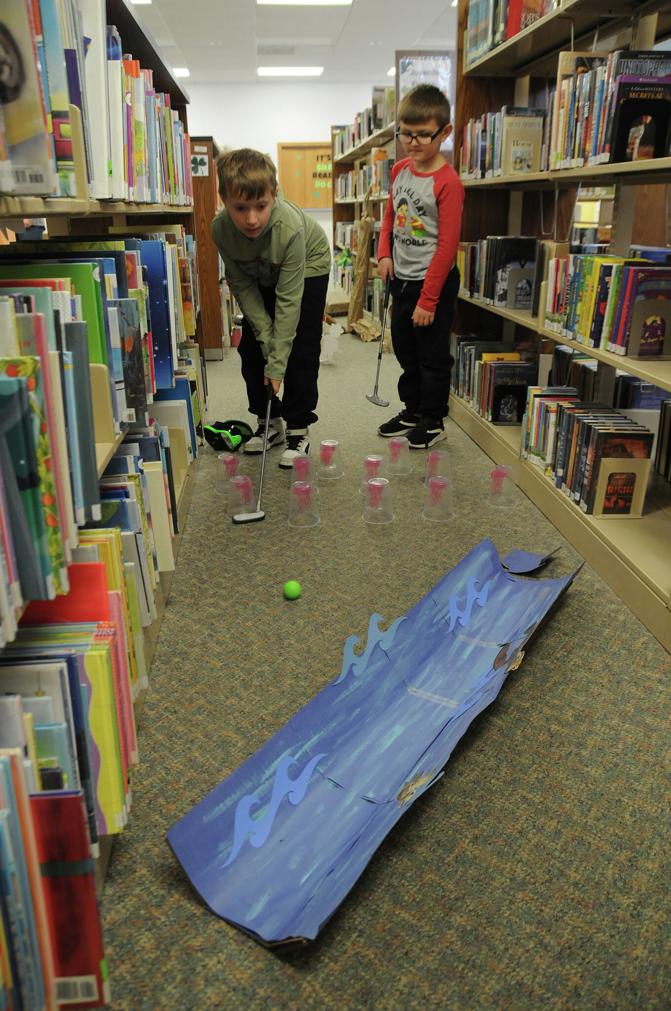 East Alton library transforms into indoor mini-golf course